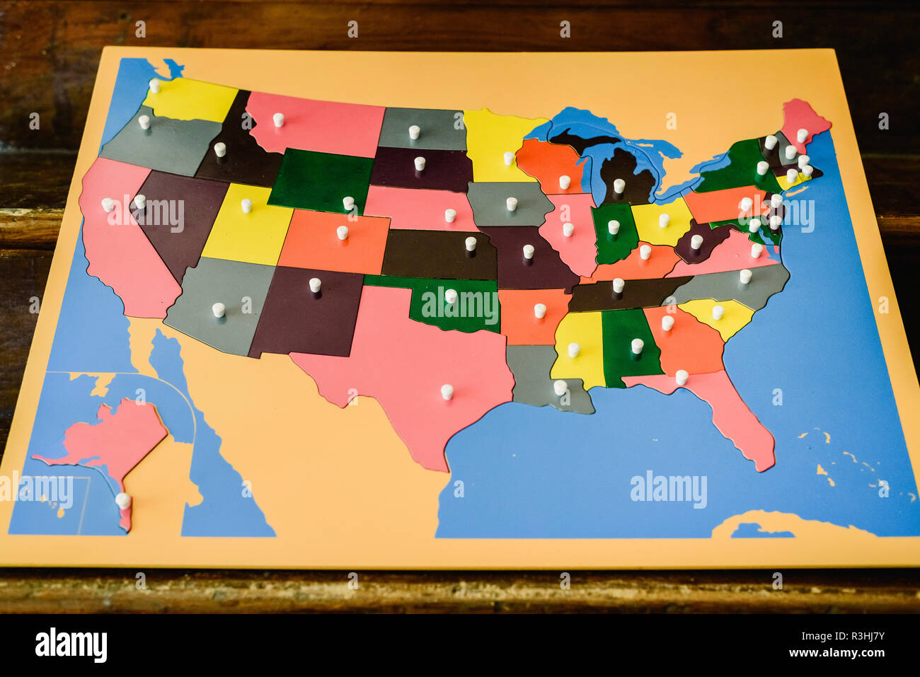 Puzzle with map of the states of the United States of America in a ...