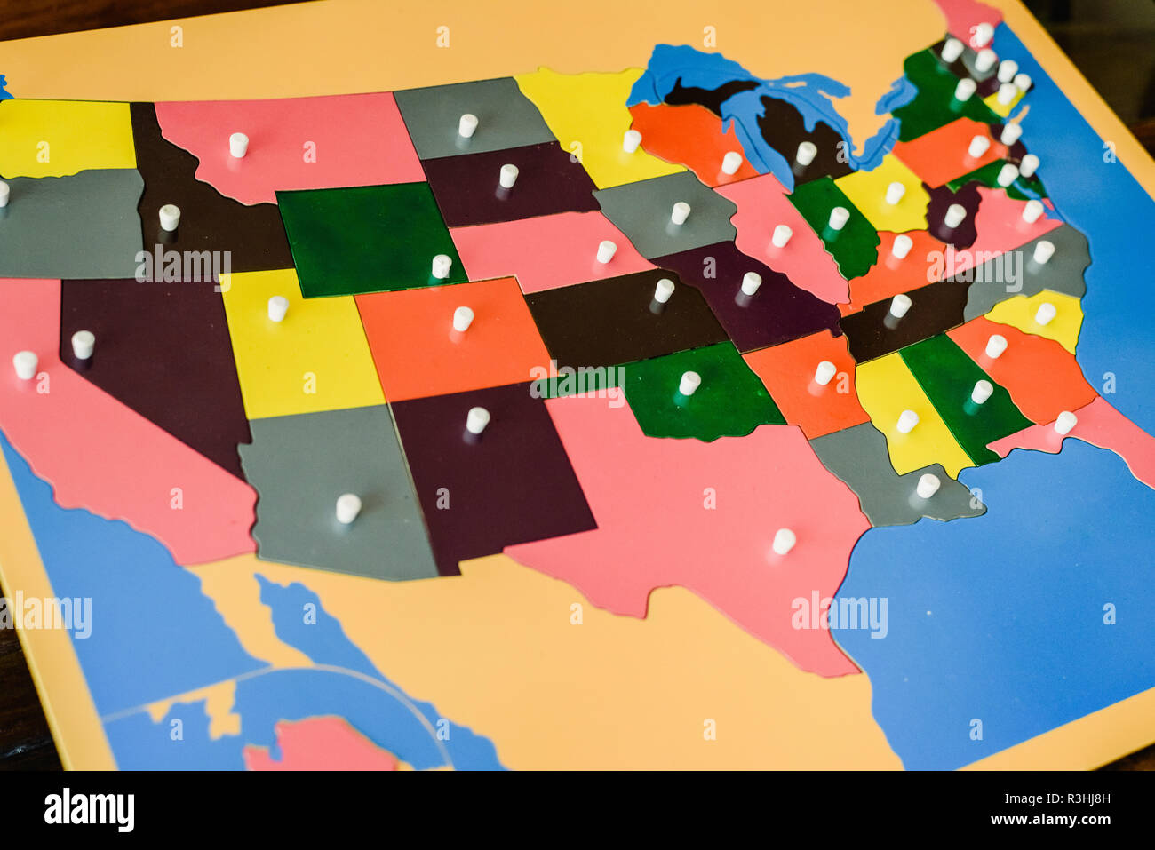 Puzzle with map of the states of the United States of America in a ...