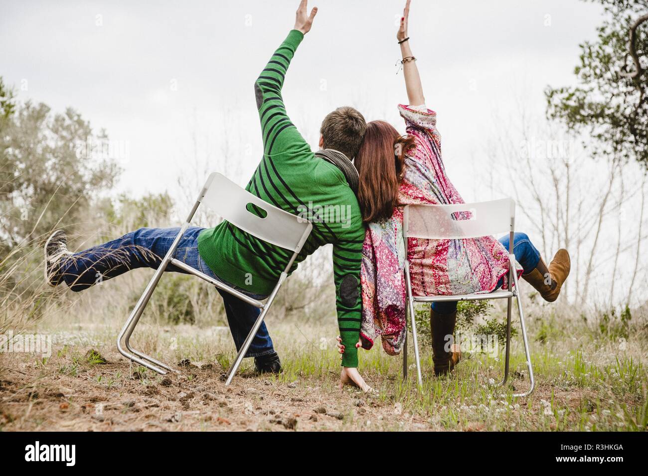 Hands on back of park chair hi-res stock photography and images - Alamy