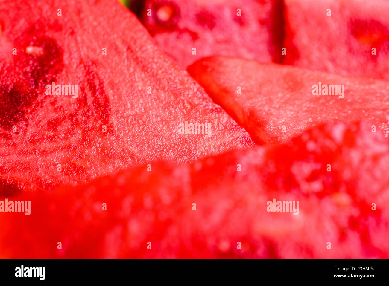 Slices of fresh juicy seedless red watermelon ideal for summer heat ...