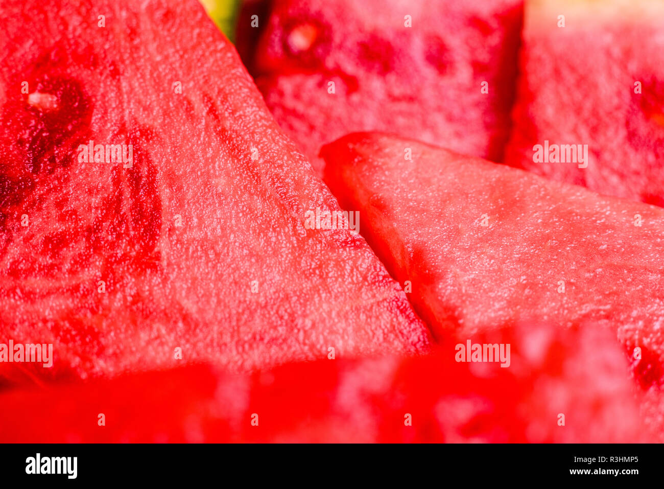 Slices of fresh juicy seedless red watermelon ideal for summer heat ...