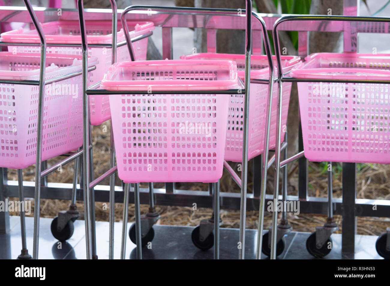 small shopping carts pink color in a Retail department store Stock ...