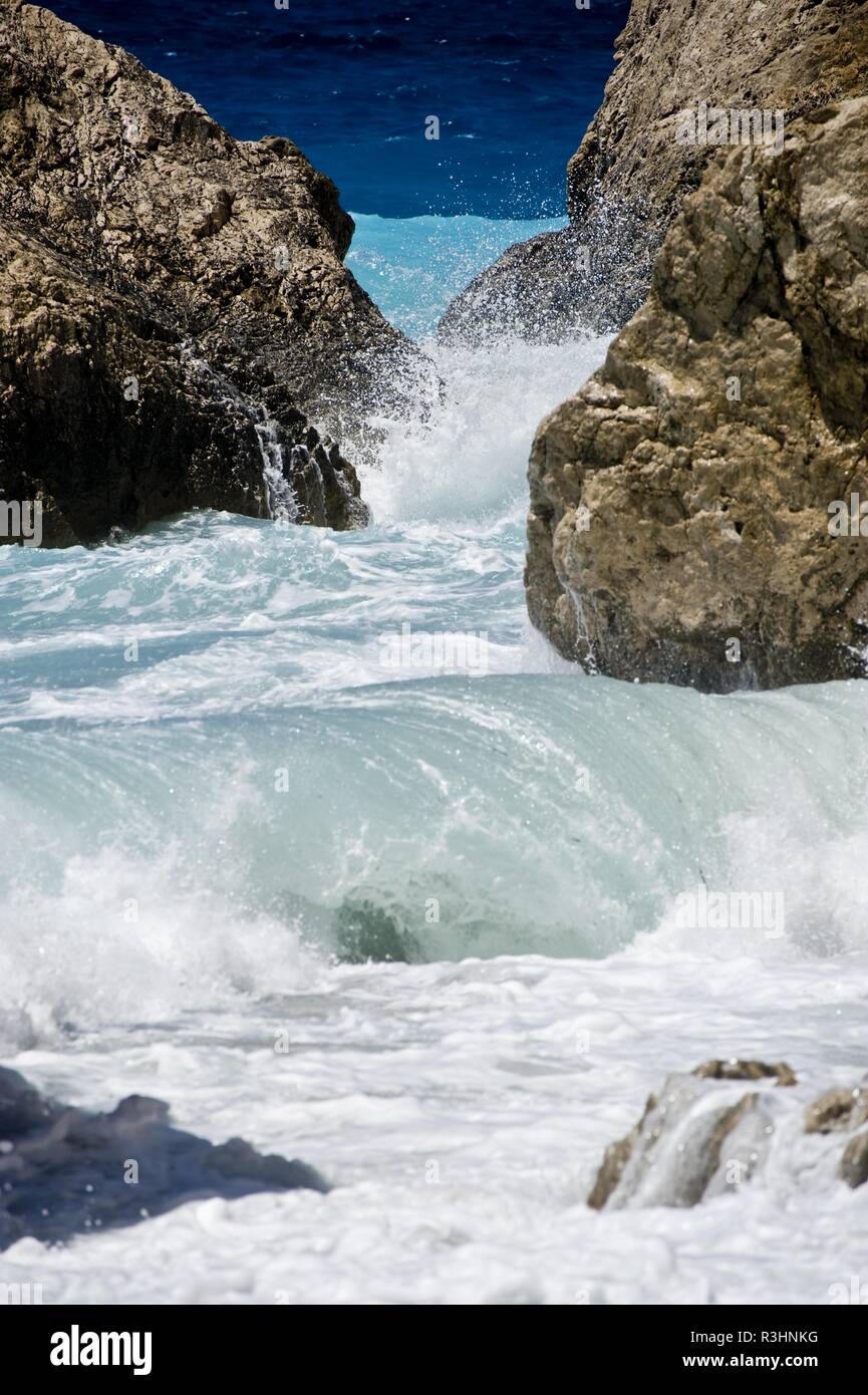 rock in the surf Stock Photo - Alamy
