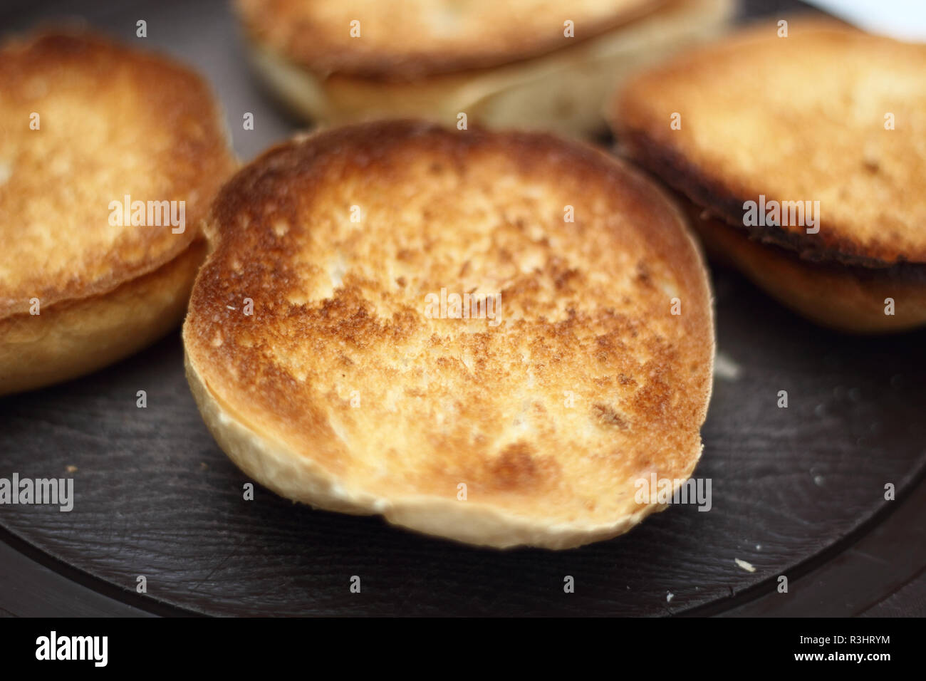 Toasted halves of bread rolls Stock Photo - Alamy