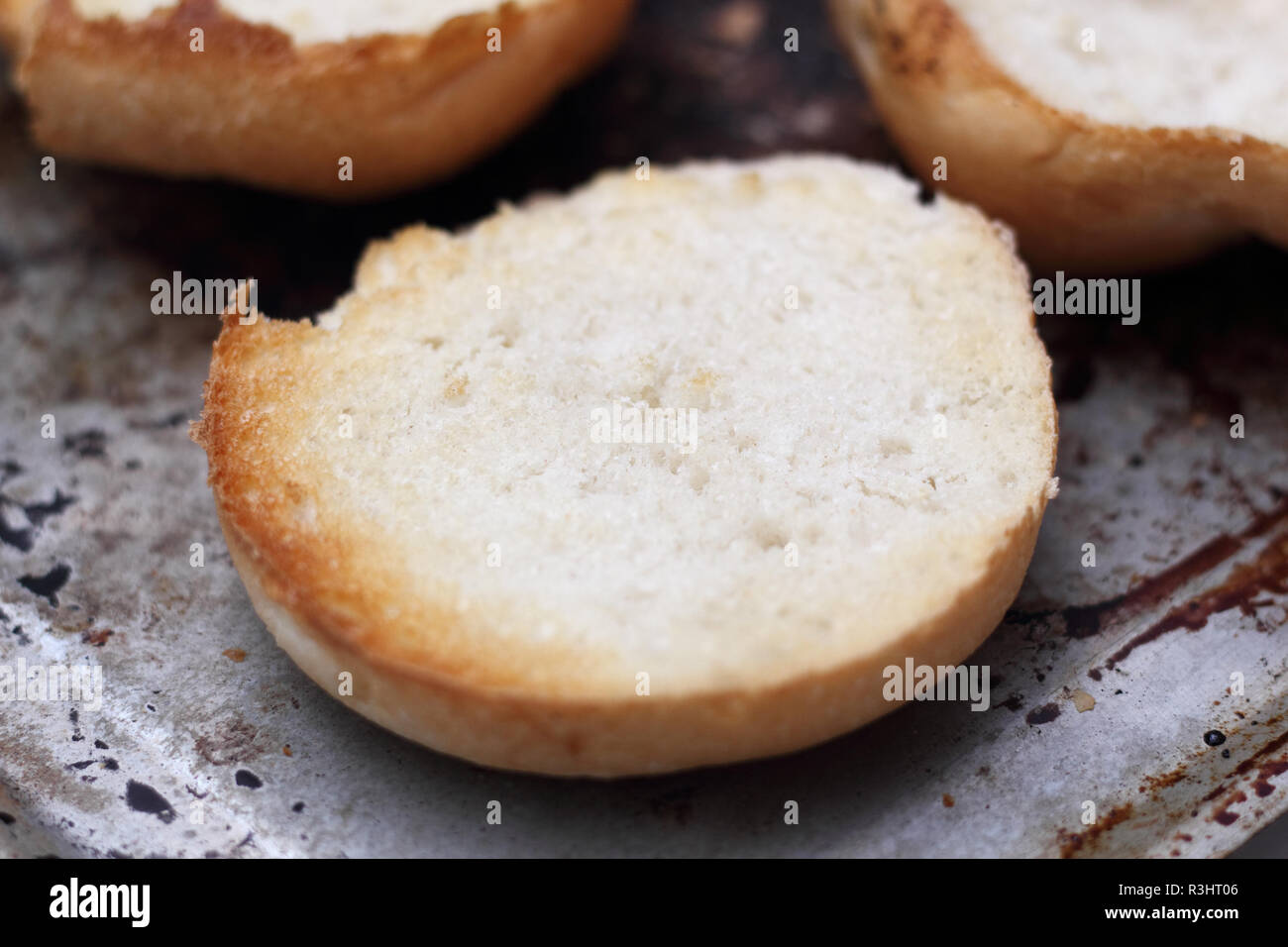 Toasted halves of bread rolls Stock Photo - Alamy