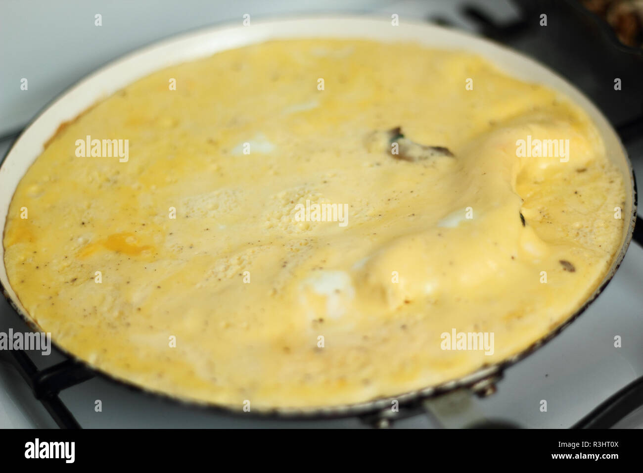 Preparation omelet on frying pan hi-res stock photography and images ...