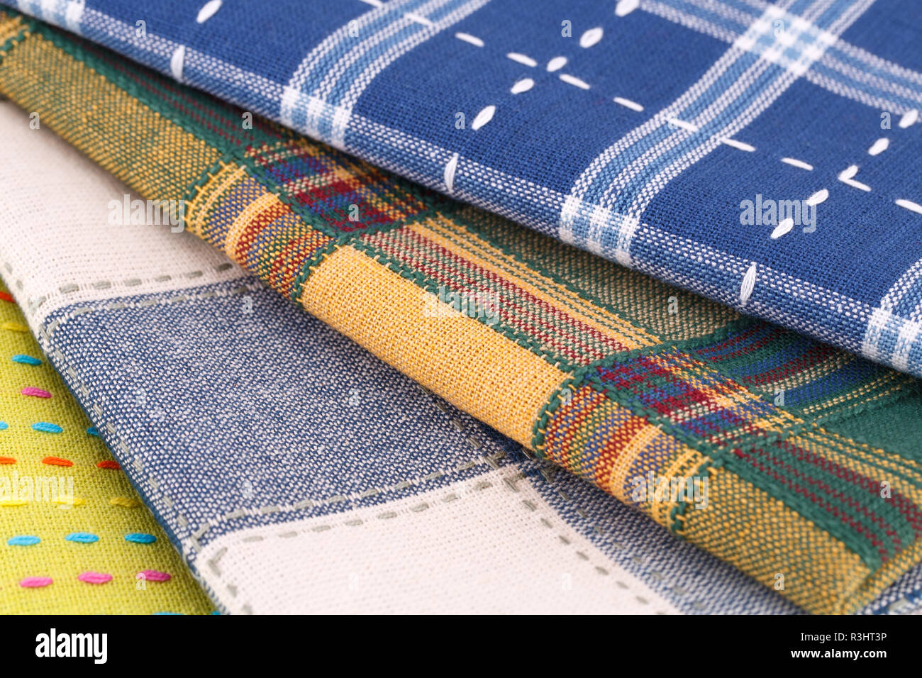 Stack of colorful kitchen towels closeup picture Stock Photo - Alamy