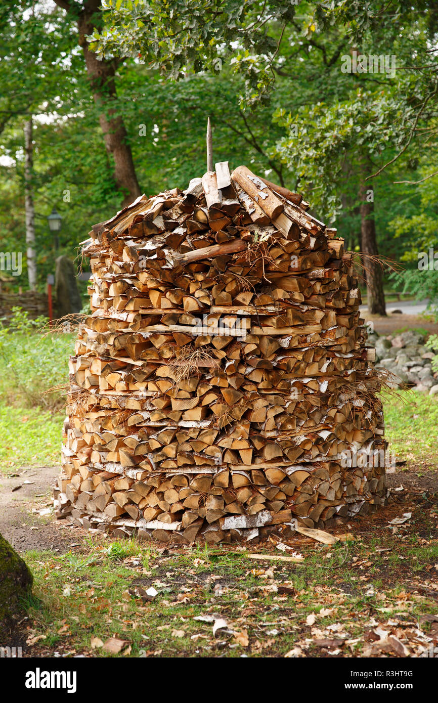 Stack of firewood in village Stock Photo - Alamy