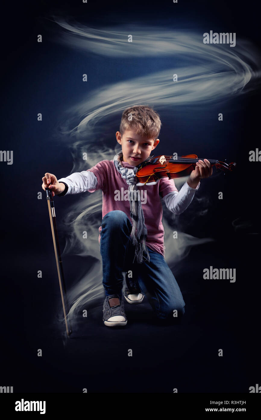 Boy plays violin hi-res stock photography and images - Alamy