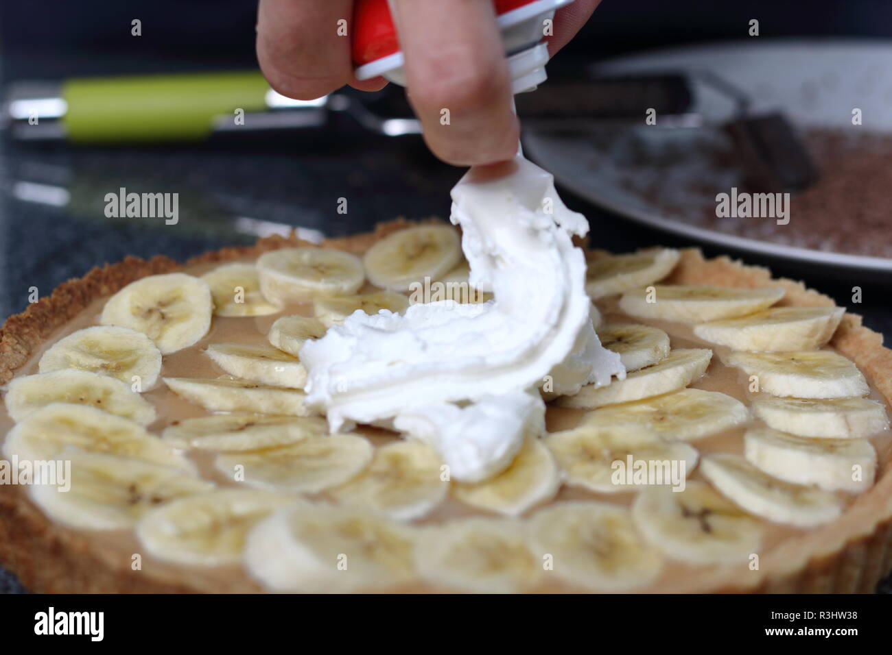 Pipe Whipped Cream in Center Filling. Making Boston Banoffee Pie Stock ...