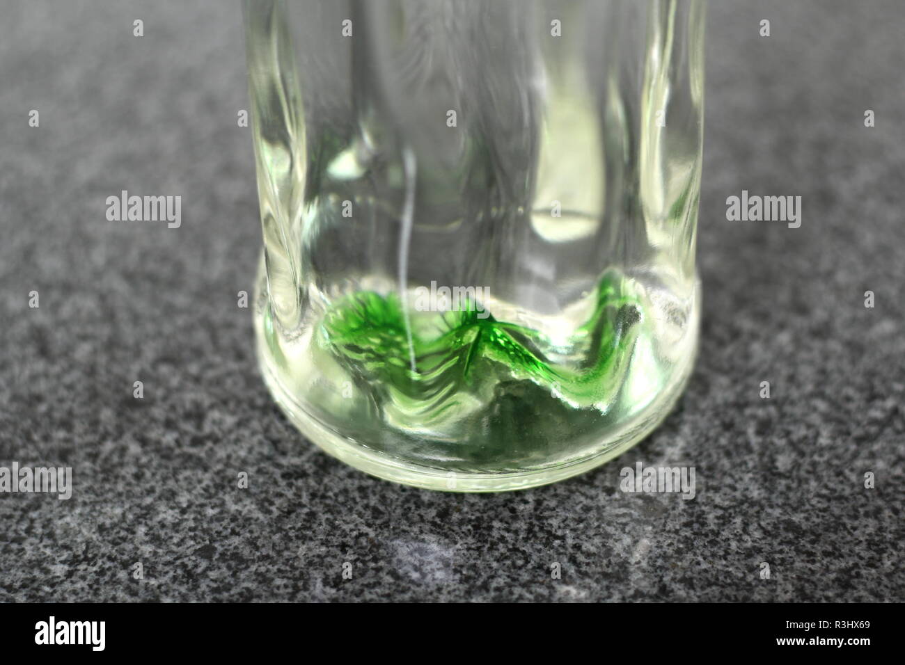 Bottom of Vodka Bottle on Granite Surface Stock Photo - Alamy