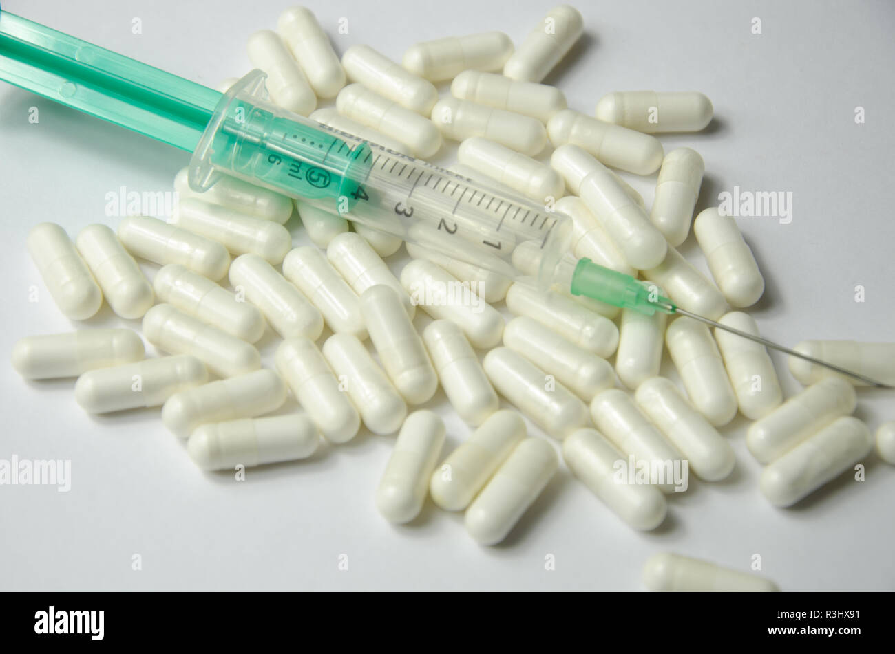 syringe with tablets Stock Photo - Alamy