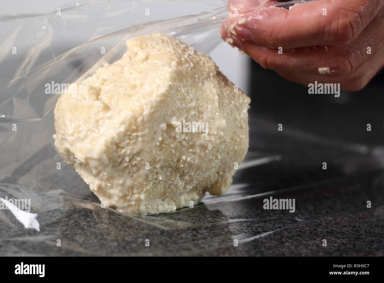 Wrap dough ball in plastic film. Making Shoofly Tart Series Stock Photo ...