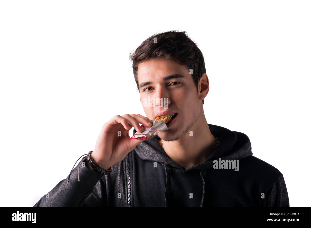 Man eating cereal bar hi-res stock photography and images - Alamy