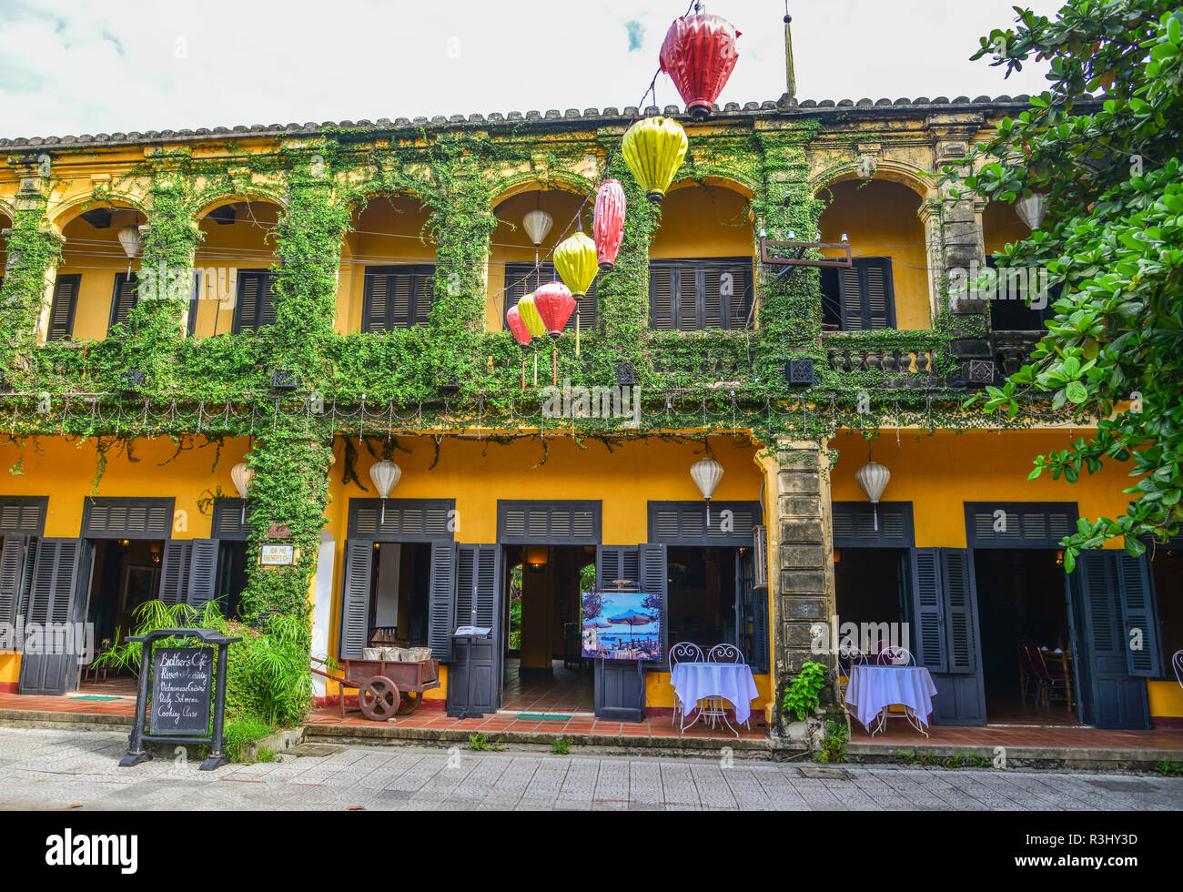 Hoi An, Vietnam - Jul 19, 2018. Old buildings in Hoi An, Vietnam. The ...