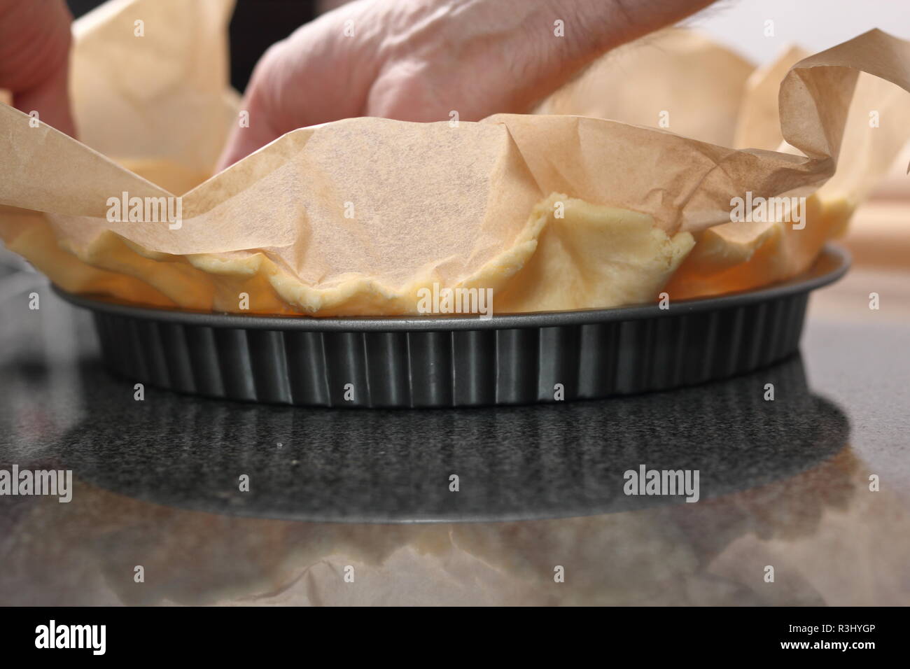 Line pastry sheet on pie dish. Making Cider Pie Series Stock Photo - Alamy