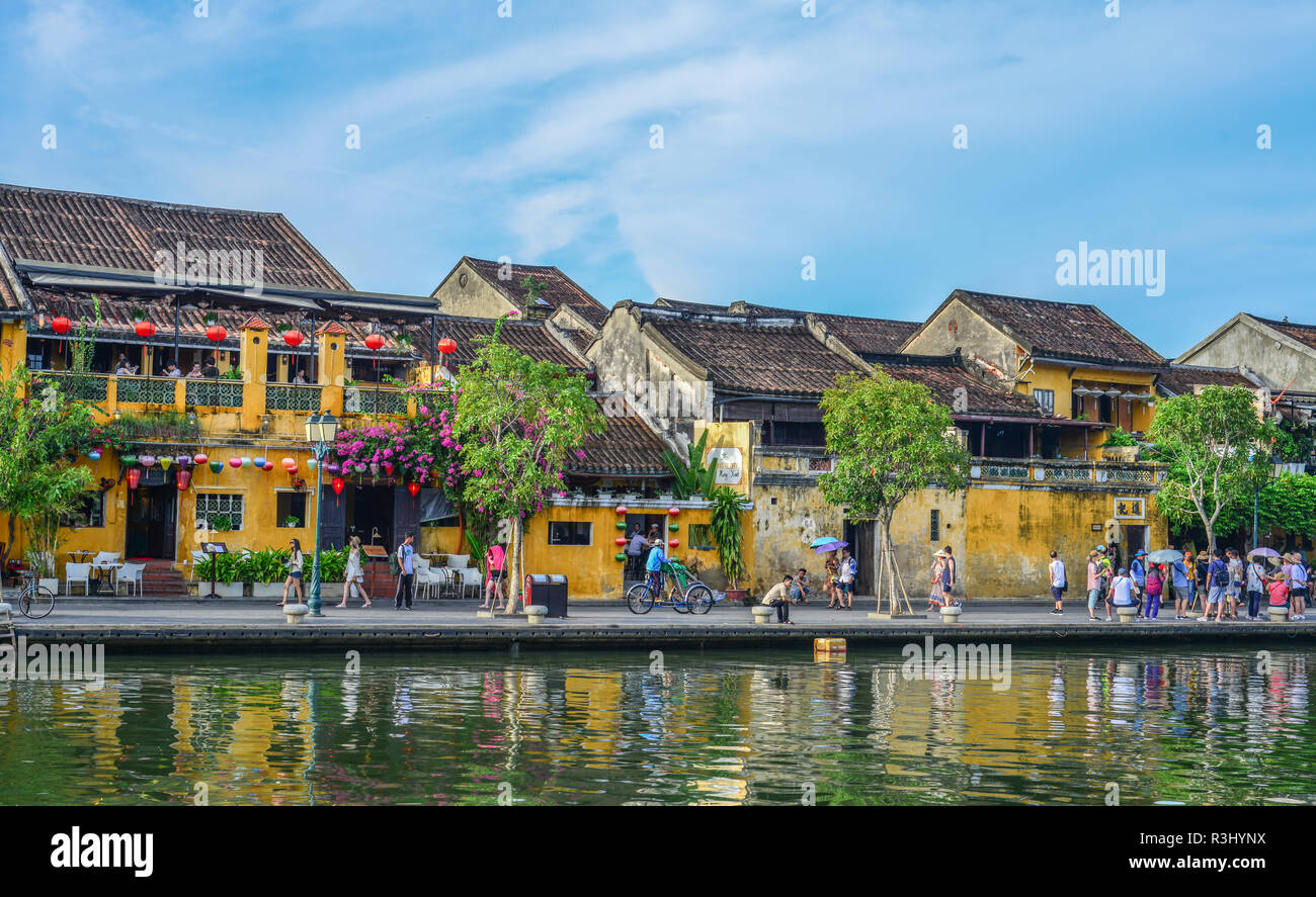 Hoi An, Vietnam - Jul 19, 2018. Old buildings with the river in Hoi An ...