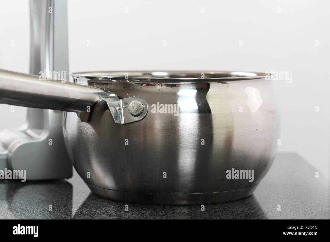 Water Dipper on Granite Table Stock Photo - Alamy