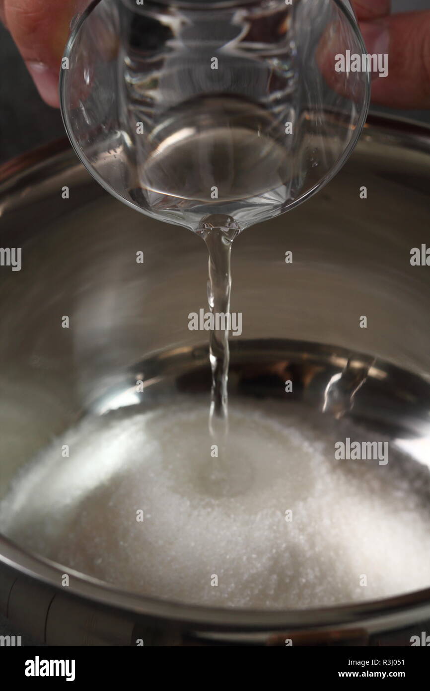 Pouring water heap sugar hi-res stock photography and images - Alamy
