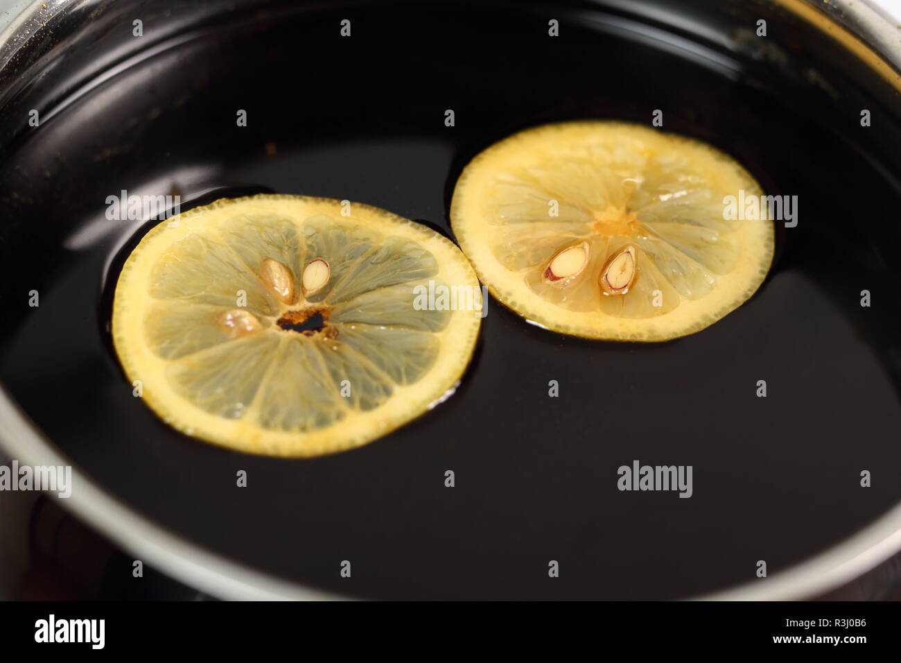 Syrup and Lemon Slices. Making Golden Syrup Series Stock Photo - Alamy