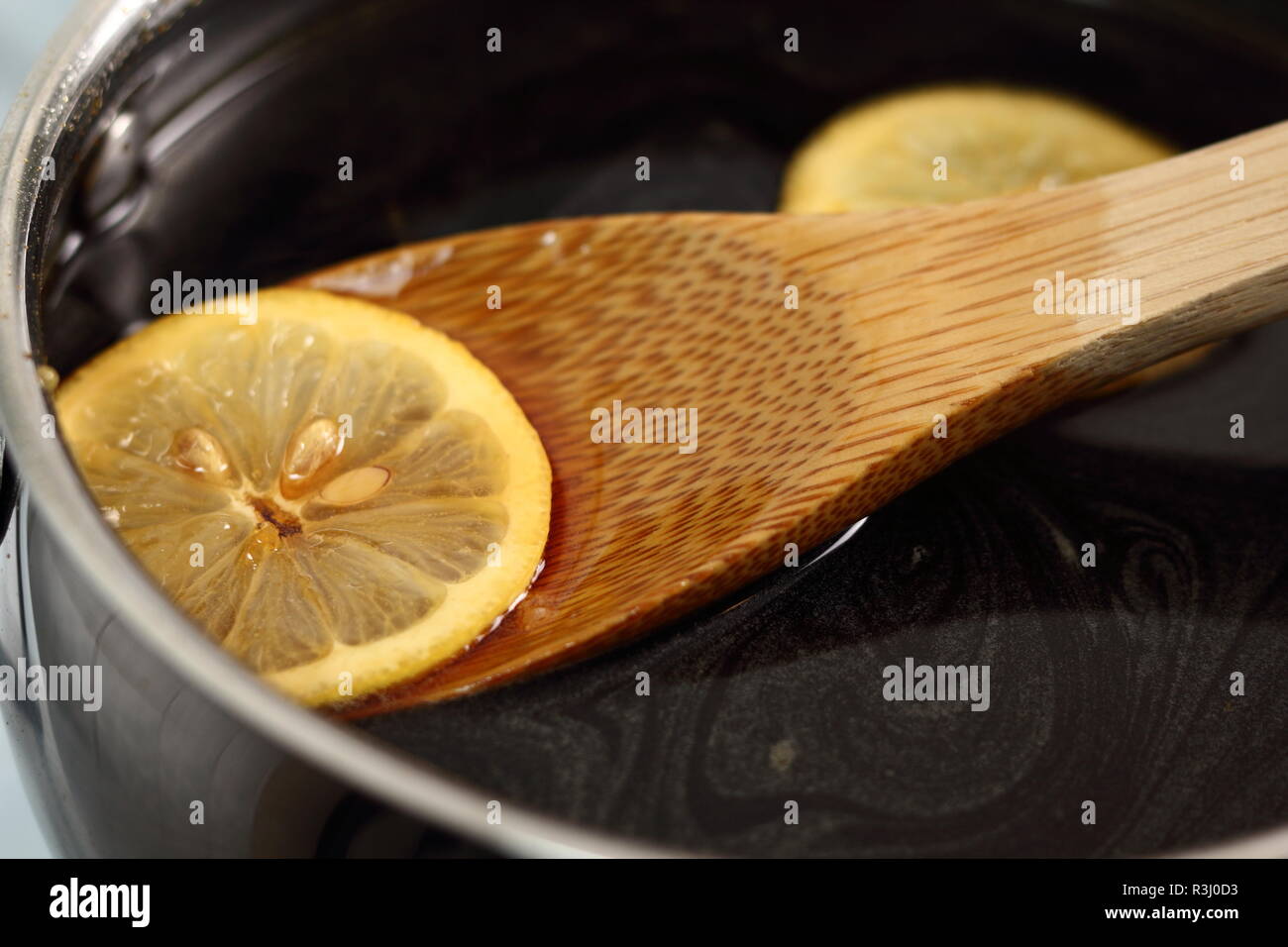 Syrup and Lemon Slices. Making Golden Syrup Series Stock Photo - Alamy