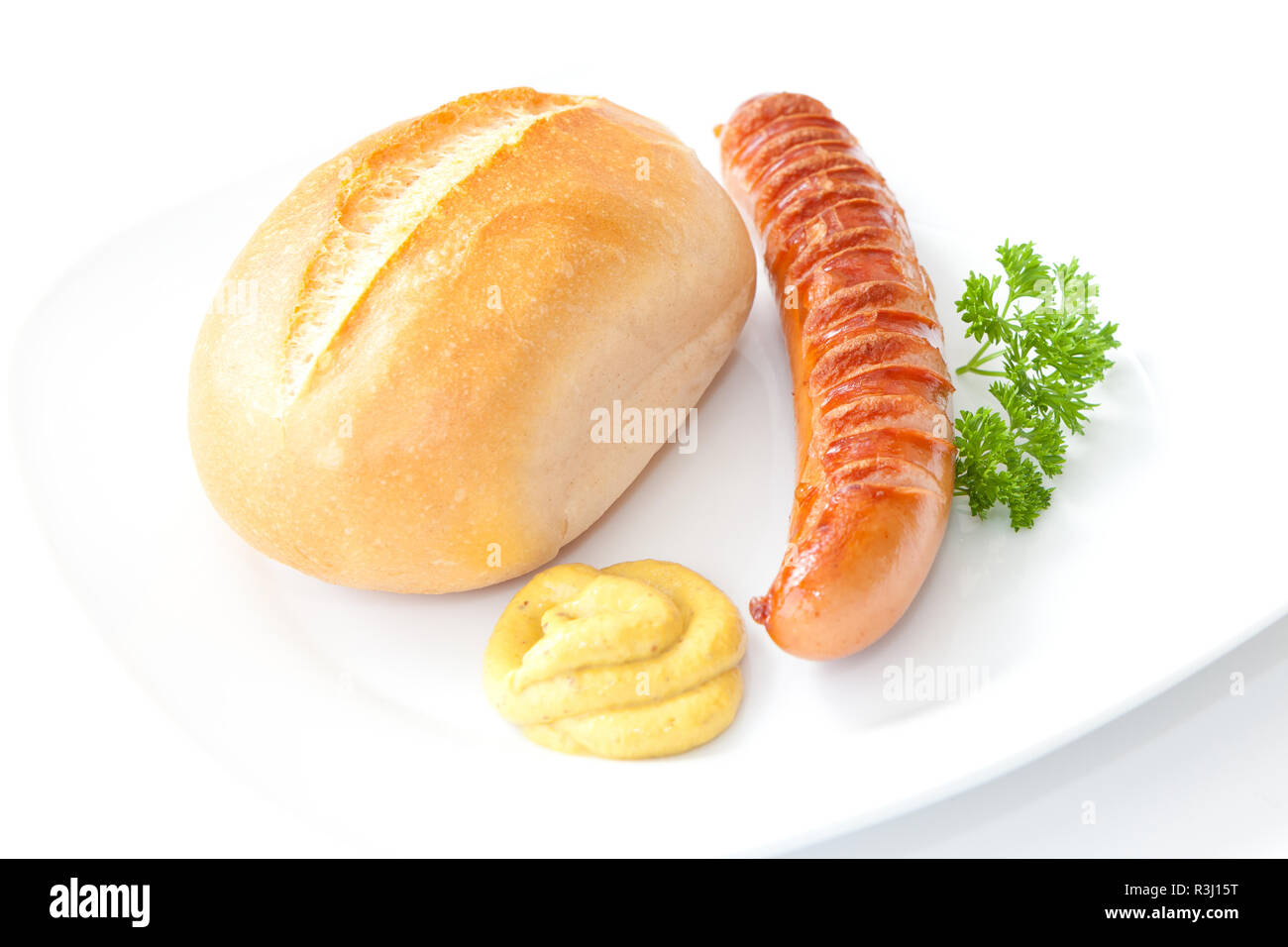 grilled sausage - bratwurst with mustard,bread and parsley Stock Photo ...