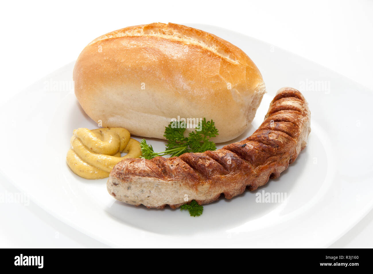 grilled sausage - bratwurst with mustard,bread and parsley Stock Photo ...