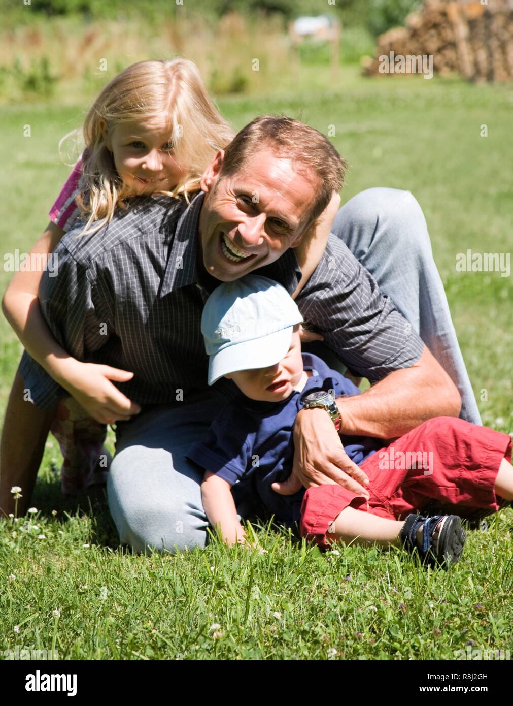 father with children Stock Photo - Alamy
