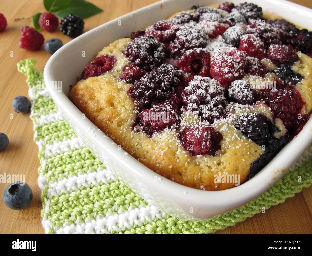 sponge cake with berries Stock Photo - Alamy
