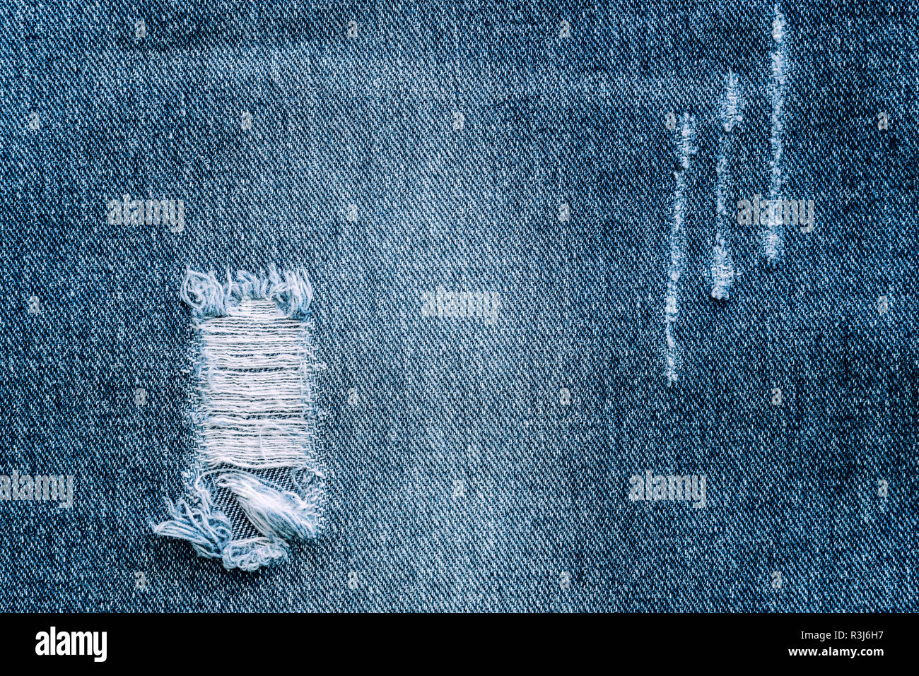Abstract background from blue denim and torn. Retro and vintage ...