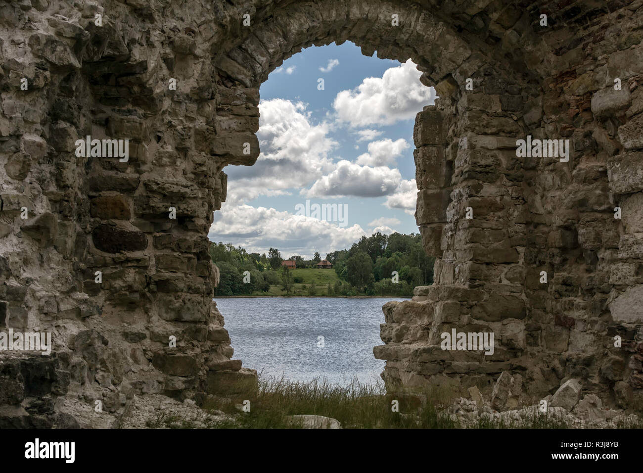 River and clouds through ruins of Koknese Castle - one of the largest ...