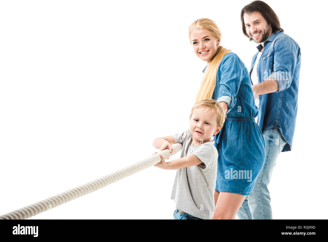 happy family pulling the rope and playing tug of war isolated on white ...