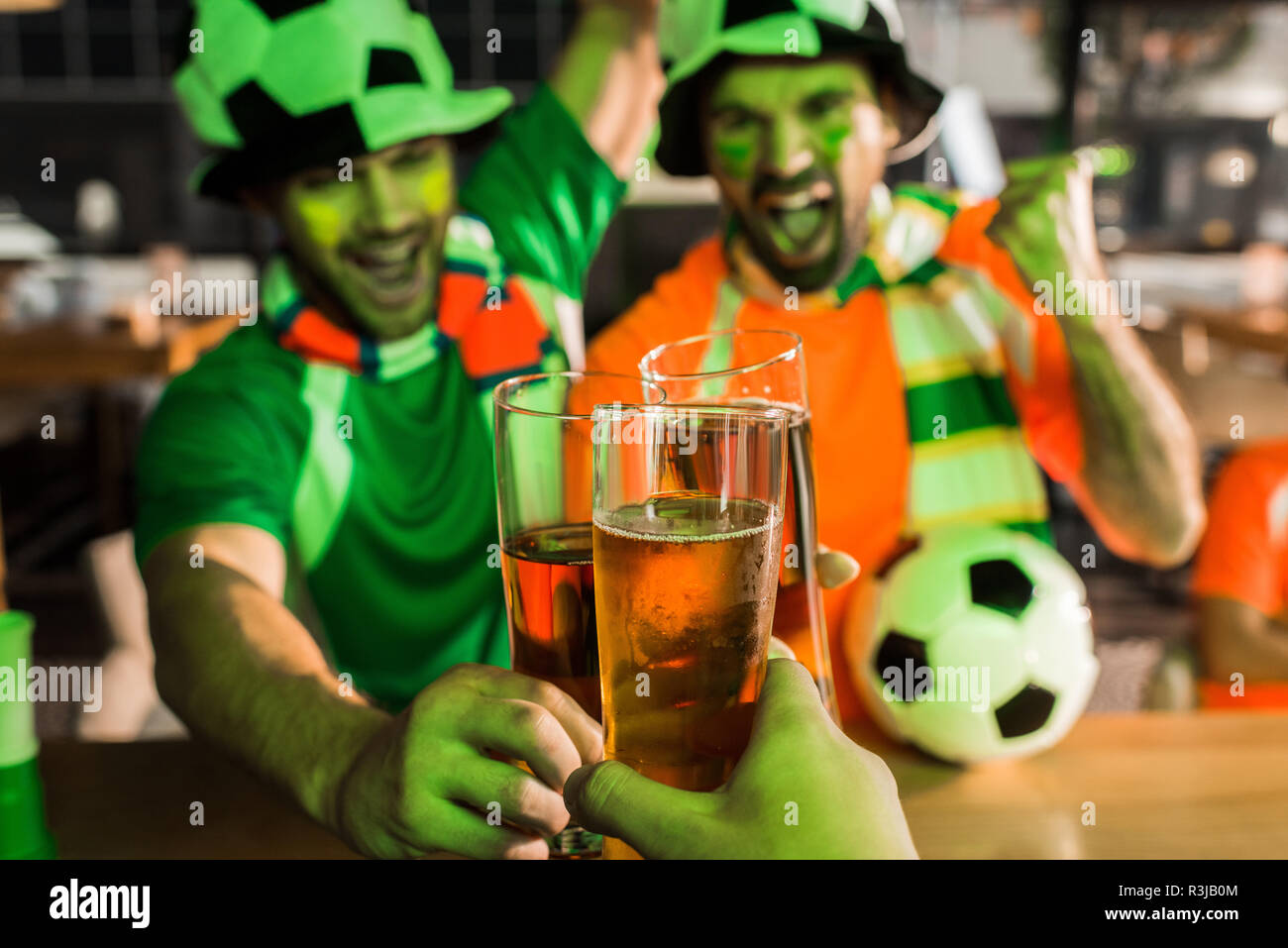 Football fans cheering beer hi-res stock photography and images - Alamy
