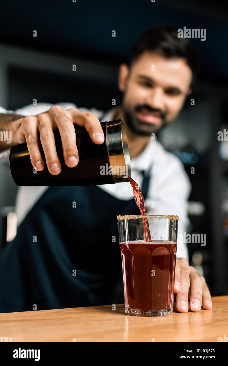 Pouring cocktail from shaker into hi-res stock photography and images ...