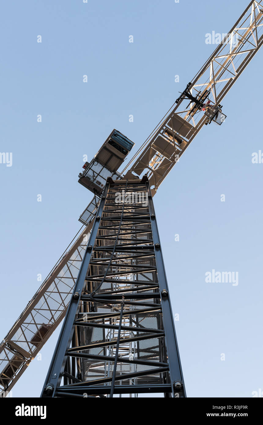 Worms eye view of a high rise tower crane Stock Photo - Alamy