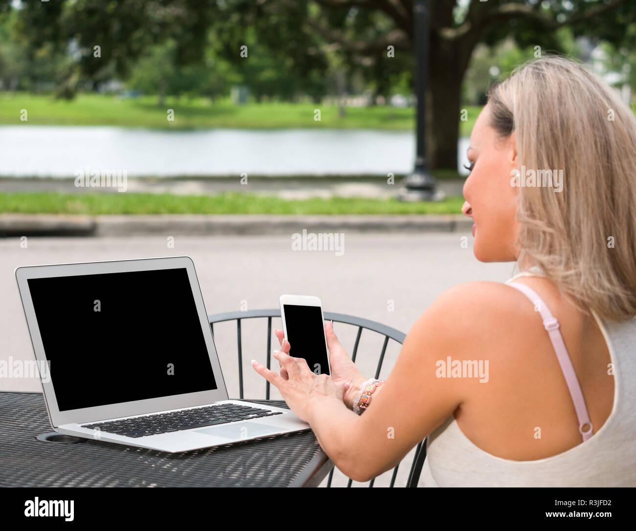 Blonde hair girl laptop hi-res stock photography and images - Alamy