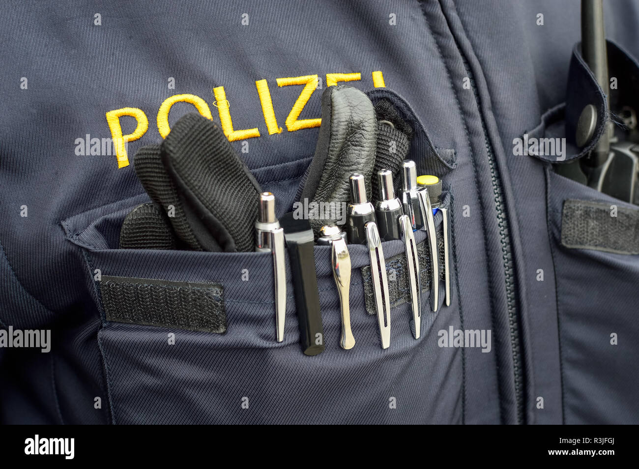 uniform police with gloves and pens Stock Photo - Alamy