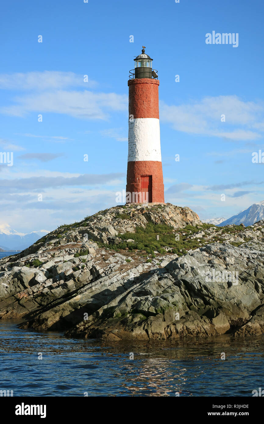 Vertical image of red and white striped Les Eclaireurs lighthouse on a ...