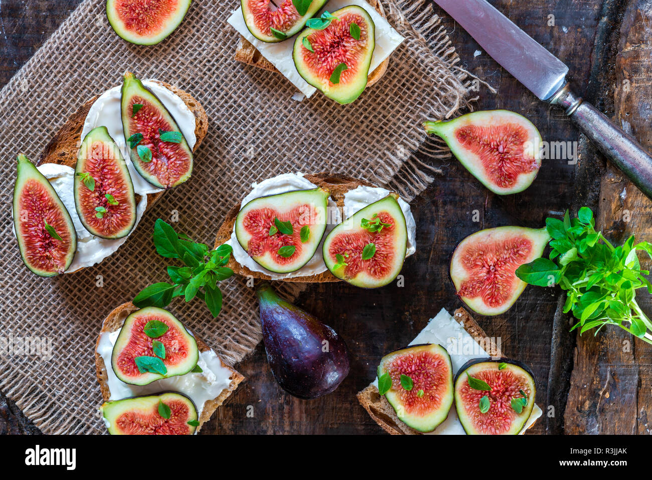 Goat cheese and figs on toast - healthy lunch idea - top view Stock ...