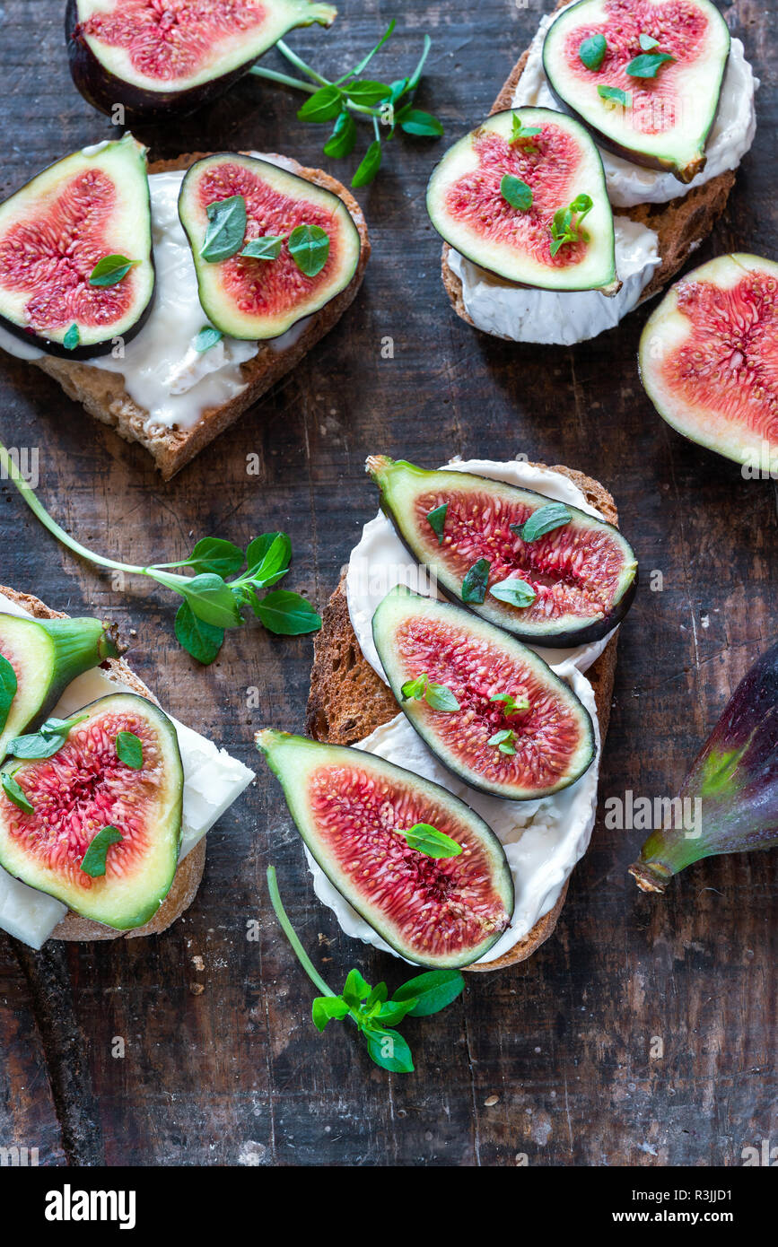 Goat cheese and figs on toast - healthy lunch idea - top view Stock ...