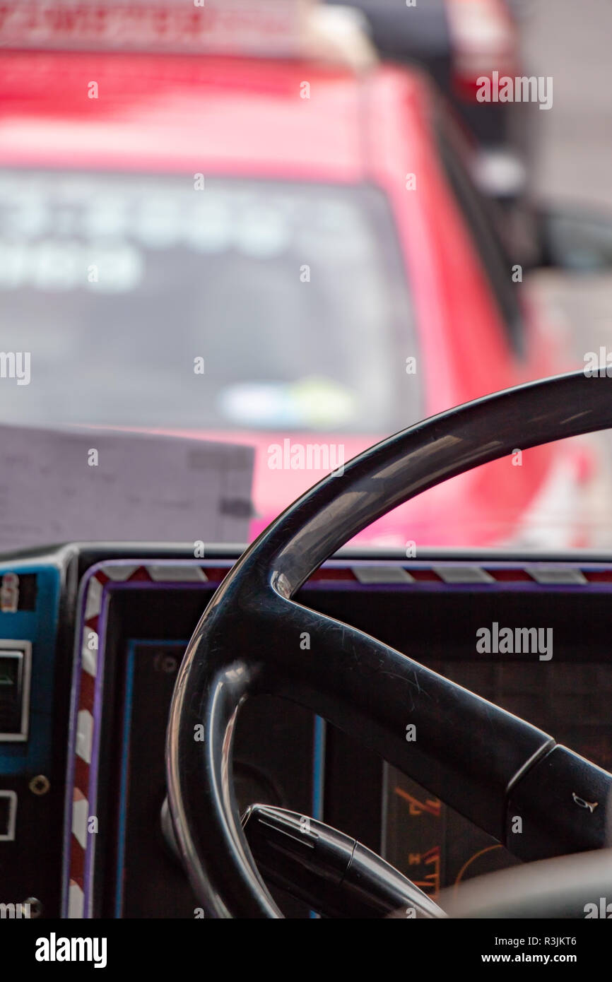 Traffic jam on the streets of Bangkok, view of public bus. Bus ride in ...
