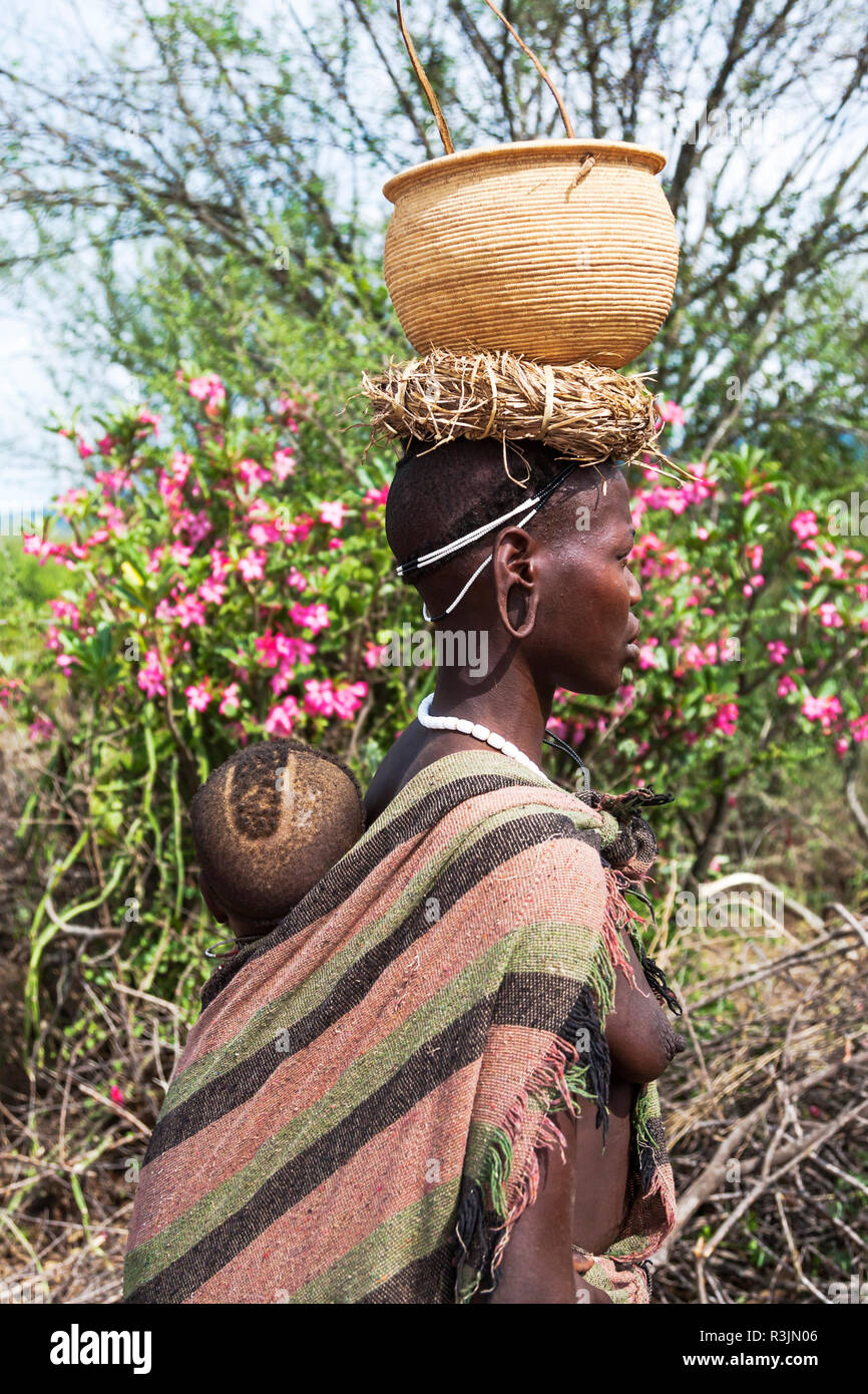 Africa, Ethiopia, Southern Omo Valley, Mursi Tribe. Mursi woman with a ...