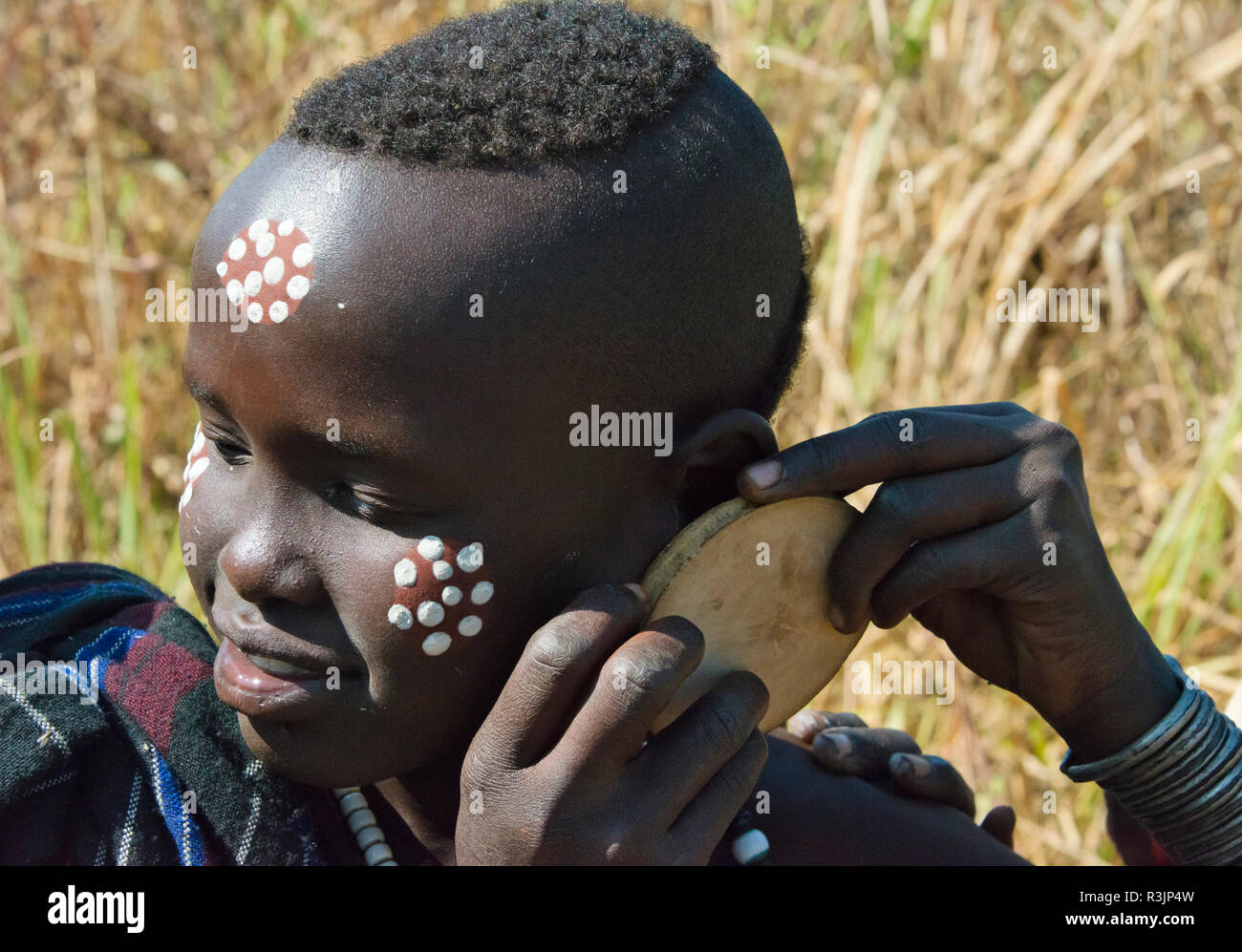 Mursi ear hi-res stock photography and images - Alamy