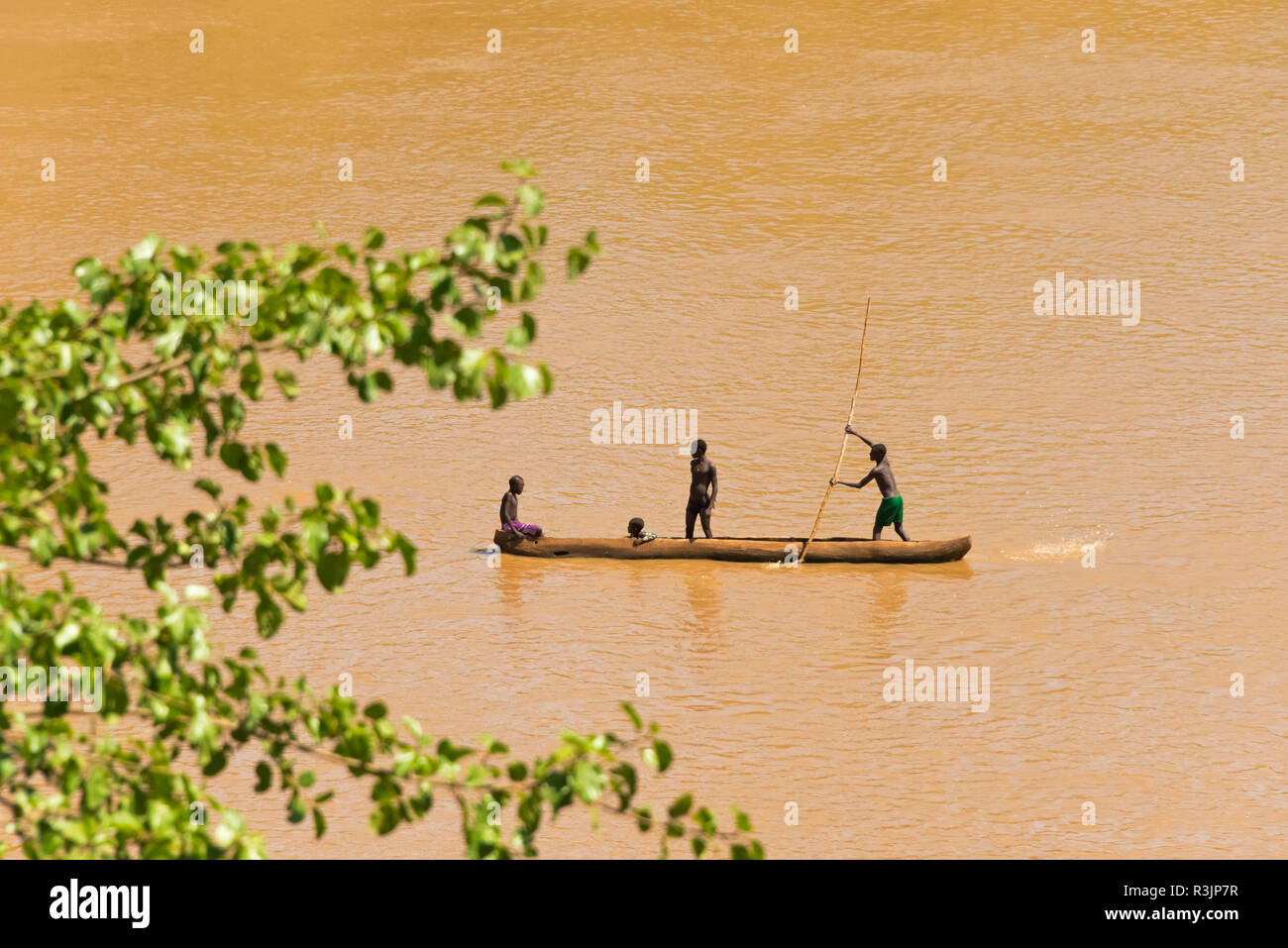 Kara tribe, people on dugout canoe on Lower Omo River, Turmi, South Omo ...
