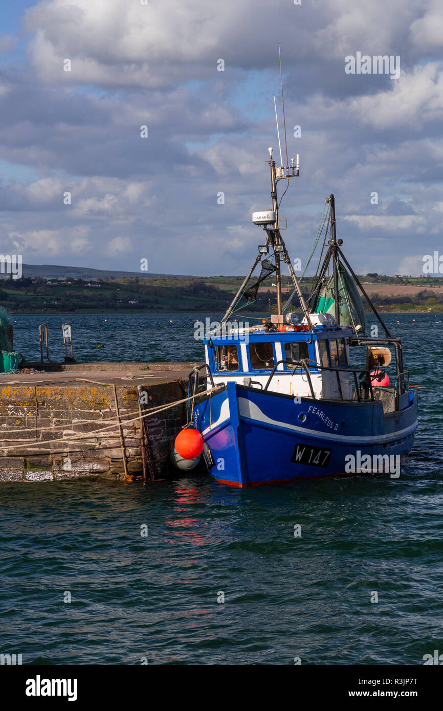 Blue fishing boat in the harbour at Youghal, County Cork, Ireland Stock ...