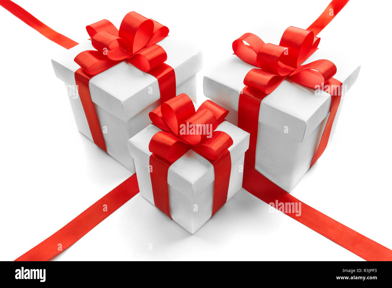 Gift boxes with red ribbon bow isolated on white background Stock Photo ...
