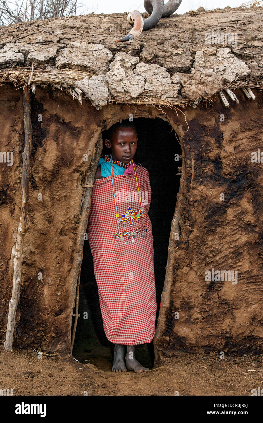 Africa, Kenya, Maasai Mara, Maasai child in doorway of hut Stock Photo ...