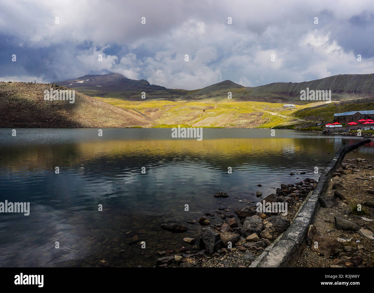 Mount Aragats Lake on the Mountain Peak with Cloudy Sky Stock Photo - Alamy