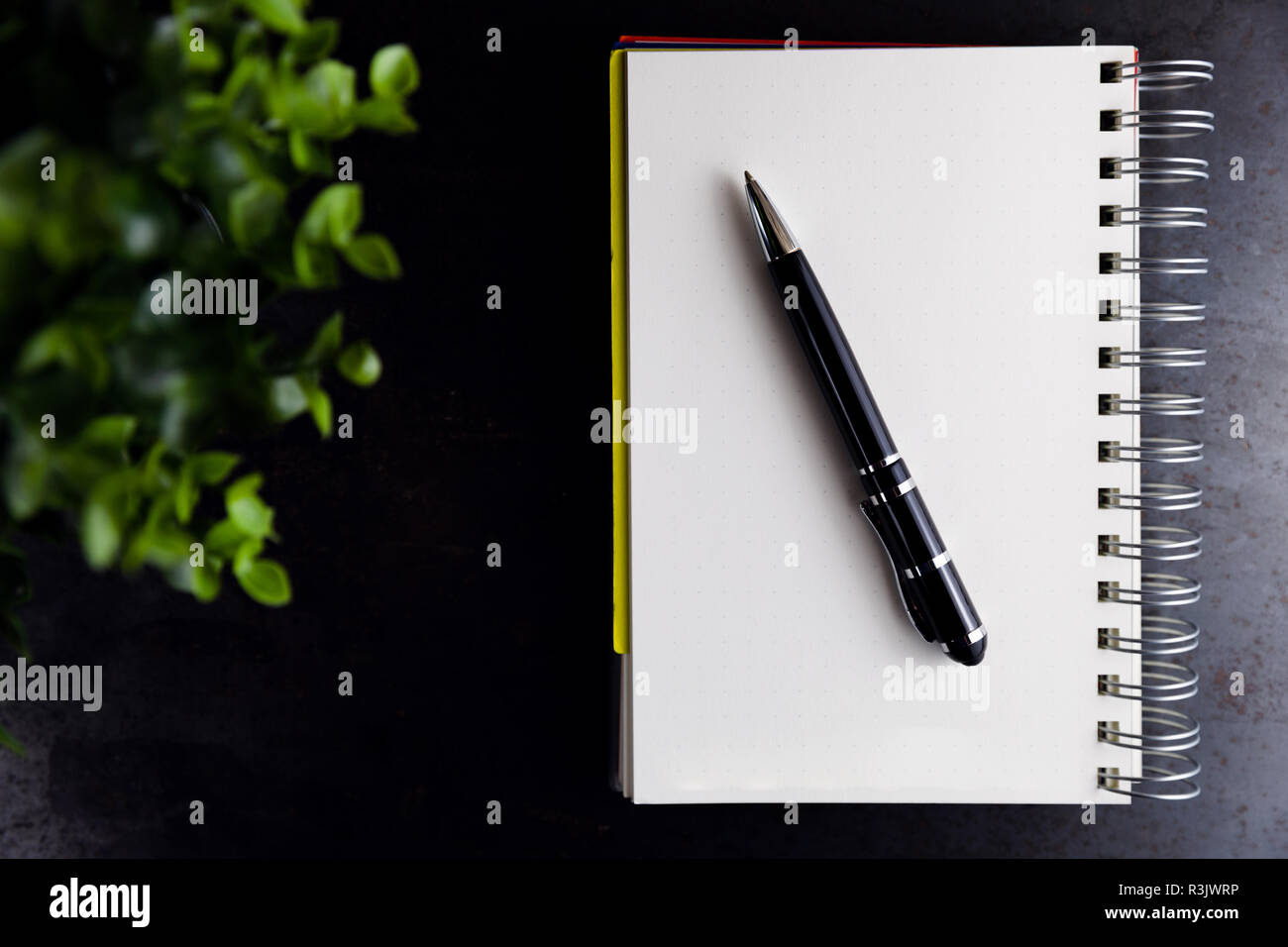 Notebook with a pencil on a rusty metal background Stock Photo - Alamy