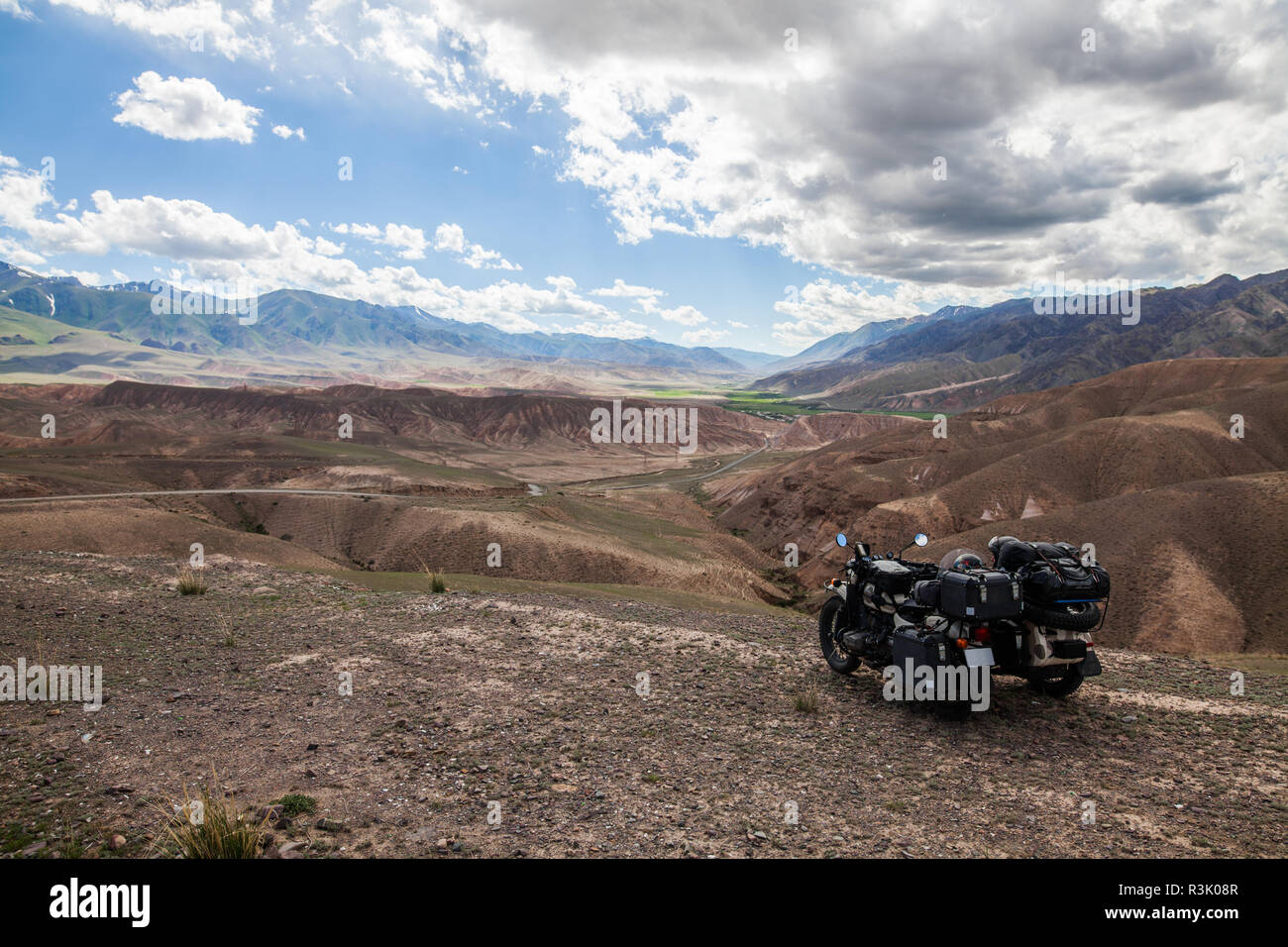 A sidecar motorcycle backed by a mountain range Stock Photo - Alamy